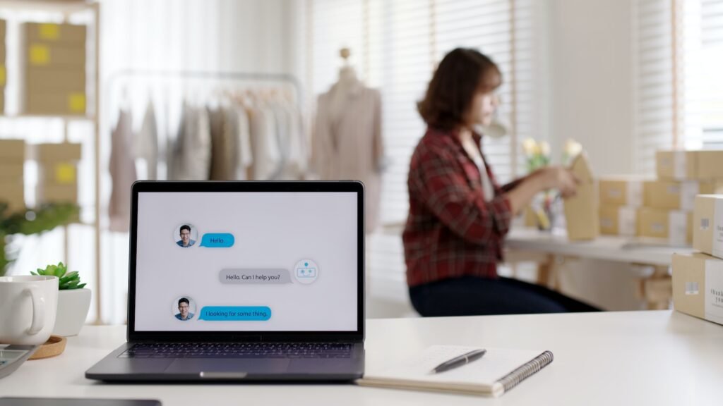 Chatbot conversation on laptop screen app interface with artificial ...